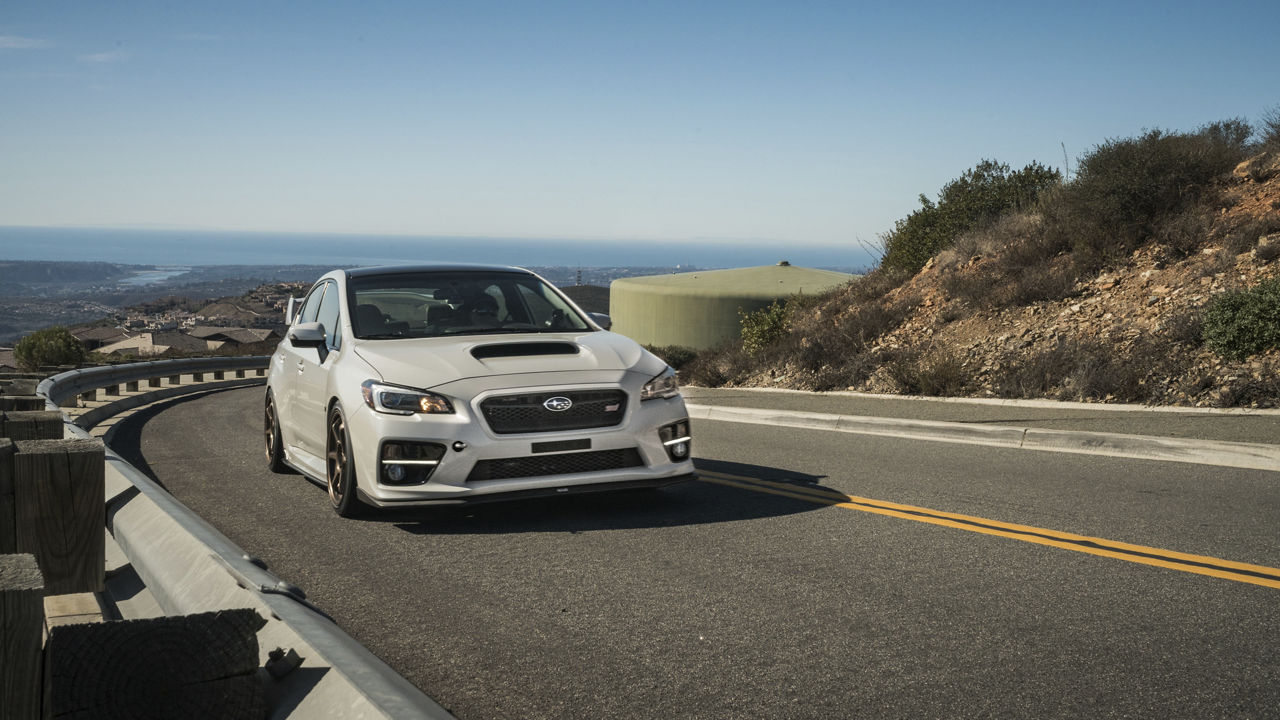 2015 Subaru WRX STI - Motegi TRAKLITE 3.0 - Bronze | Wheel Pros