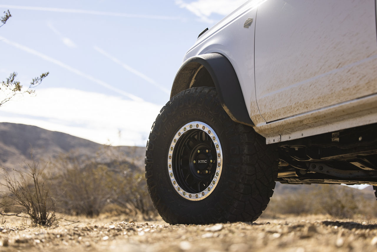 2021 Ford Bronco Raptor - KMC GRENADE DESERT BEADLOCK - Black | KMC Wheels